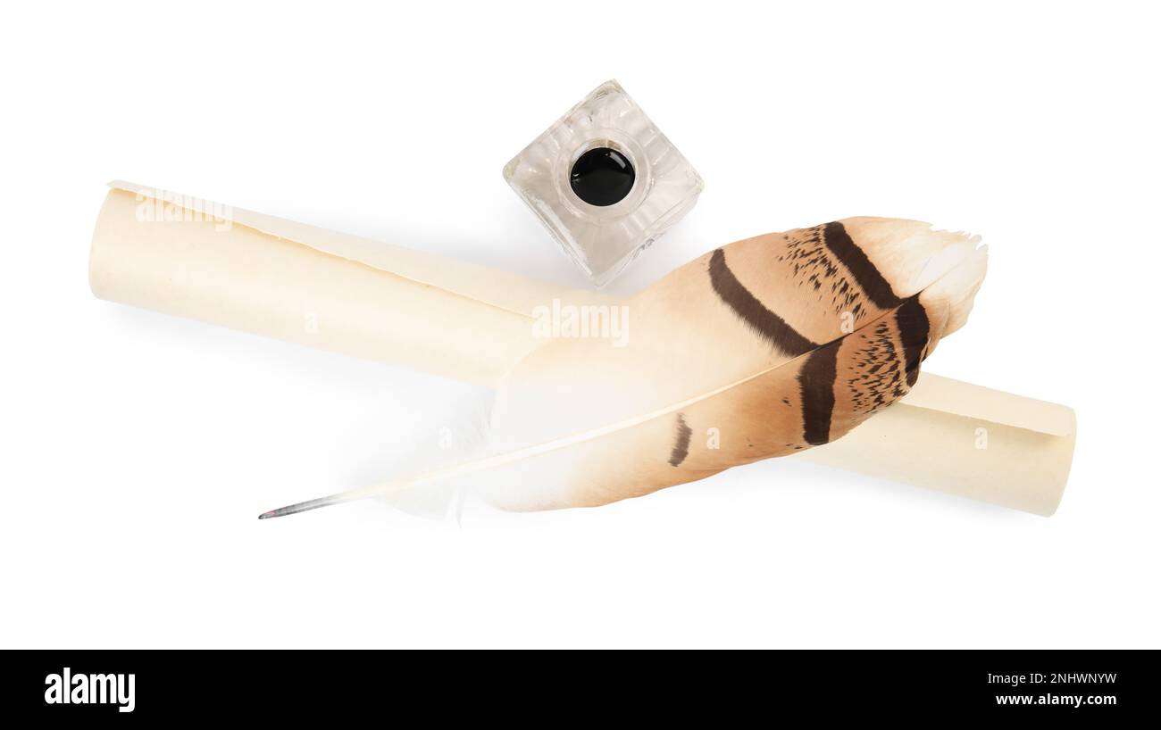 Feather pen, inkwell and scroll of parchment on white background, top ...