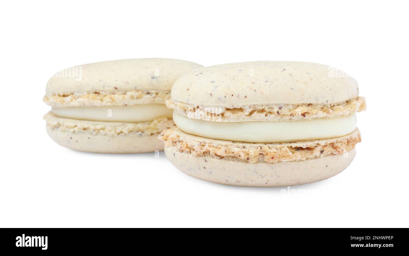 Beige macarons on white background. Delicious dessert Stock Photo - Alamy
