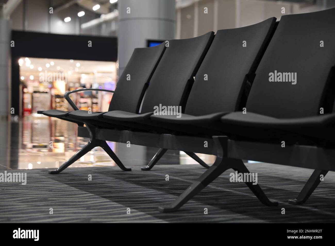 Waiting area with seats in airport terminal Stock Photo - Alamy