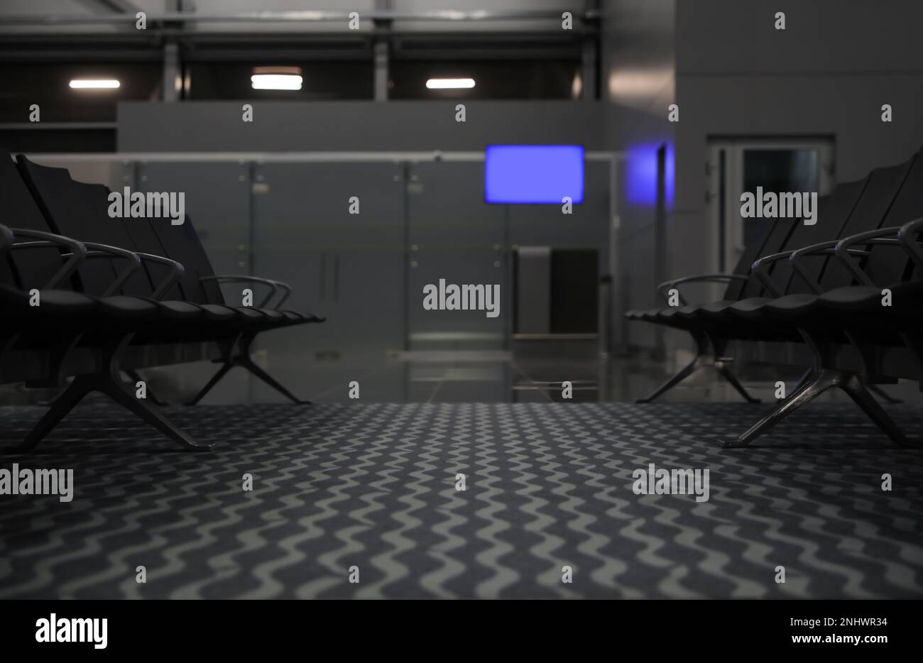 Waiting area with seats in airport terminal Stock Photo - Alamy
