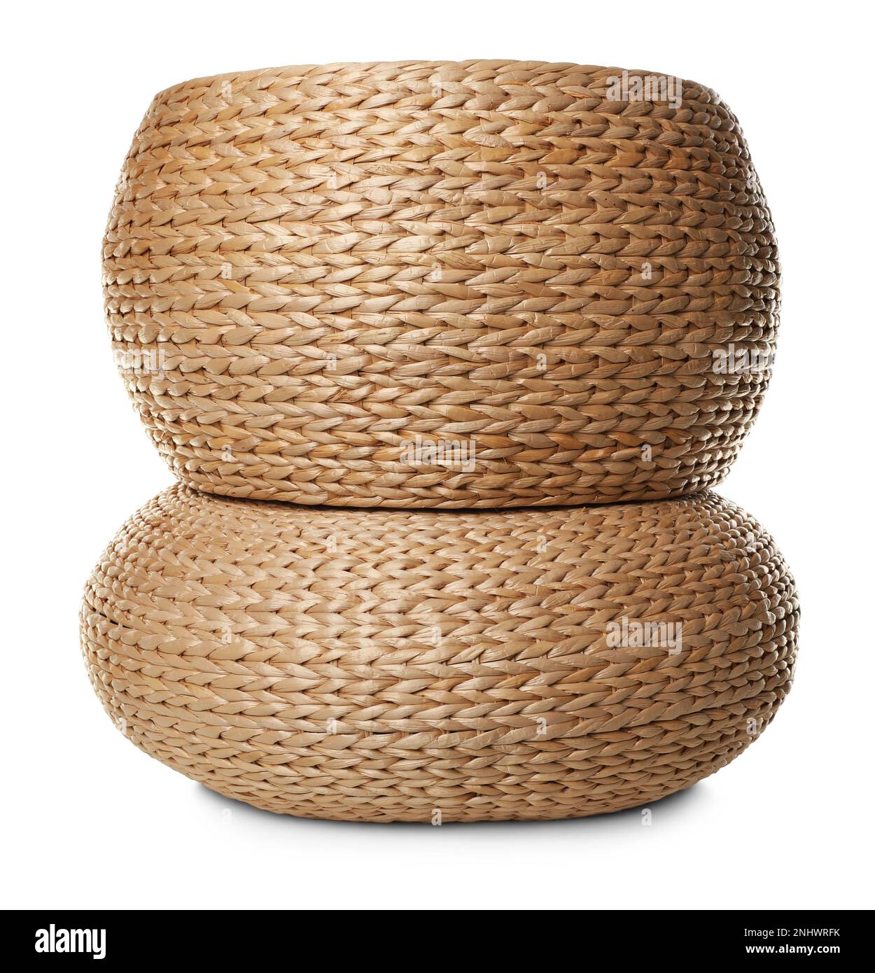 Two stylish wicker poufs on white background Stock Photo - Alamy