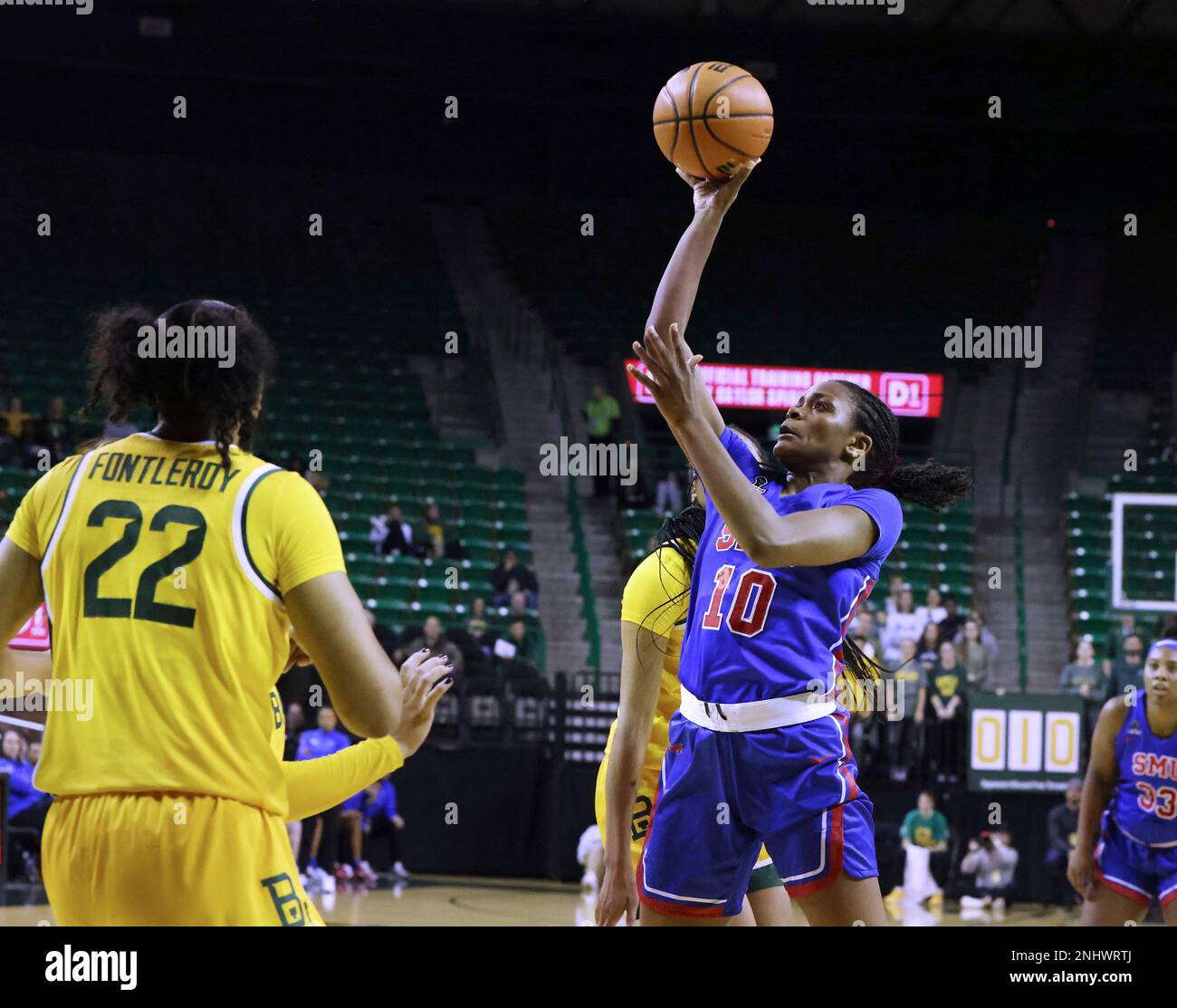 SMU guard Jasmine Smith (10) shoots as Baylor guard Bella Fontleroy (22 ...