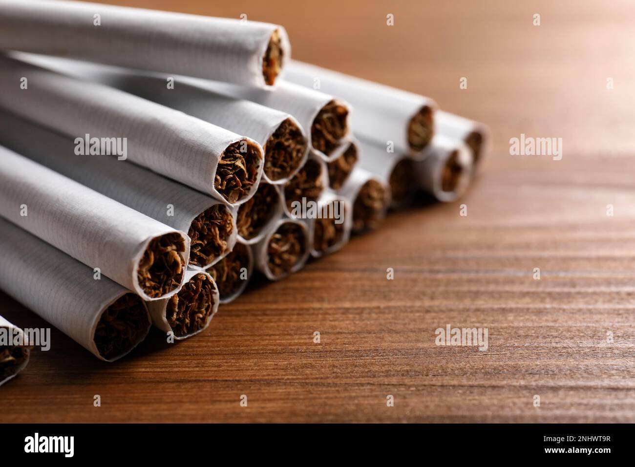 Cigarettes on wooden table hi-res stock photography and images - Alamy