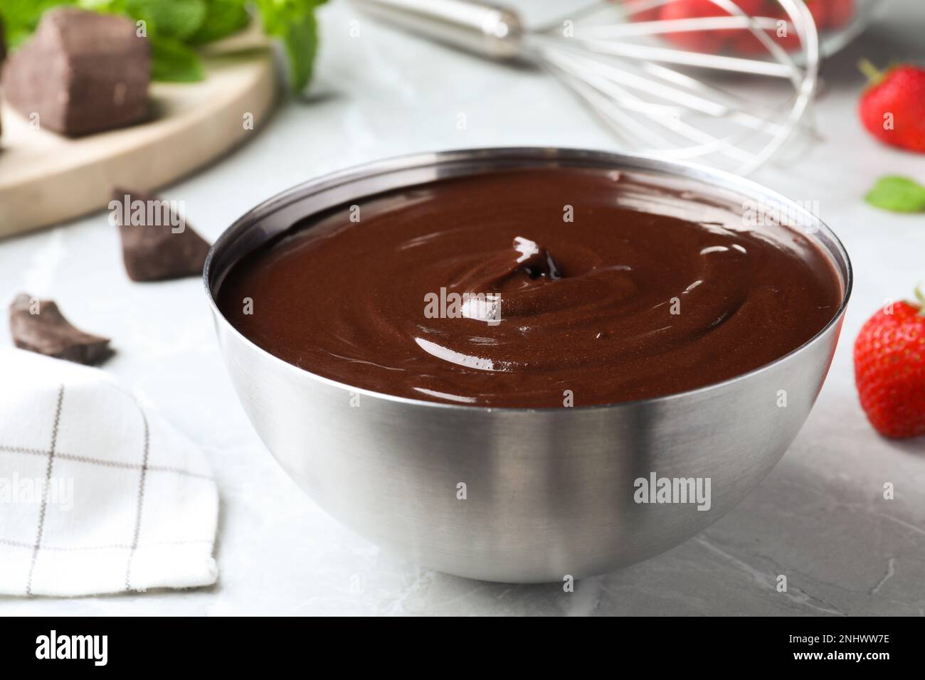 Delicious chocolate cream on grey marble table Stock Photo - Alamy