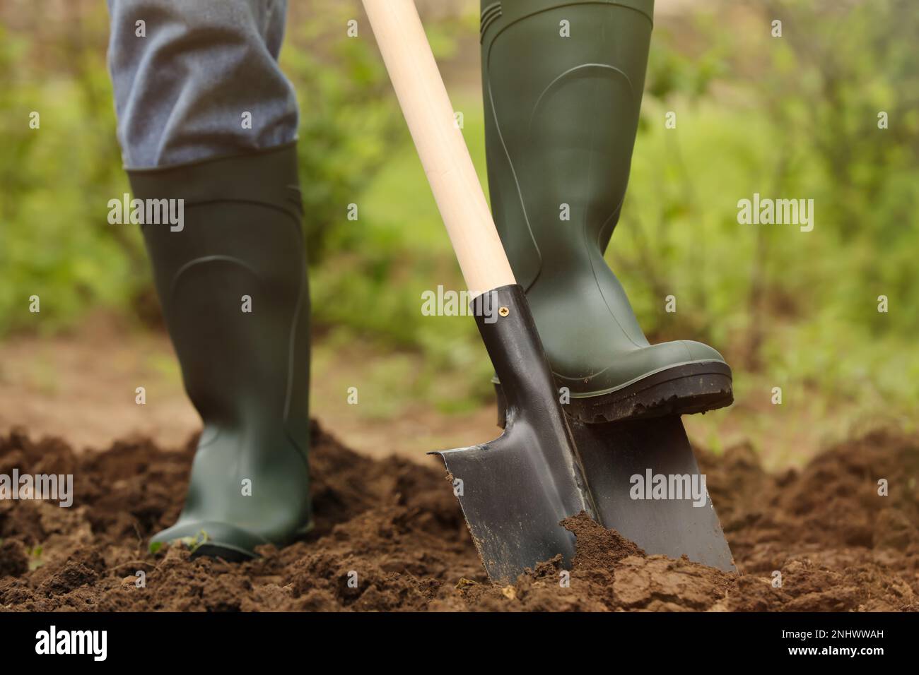 Rubber boots tool mud hi-res stock photography and images - Alamy