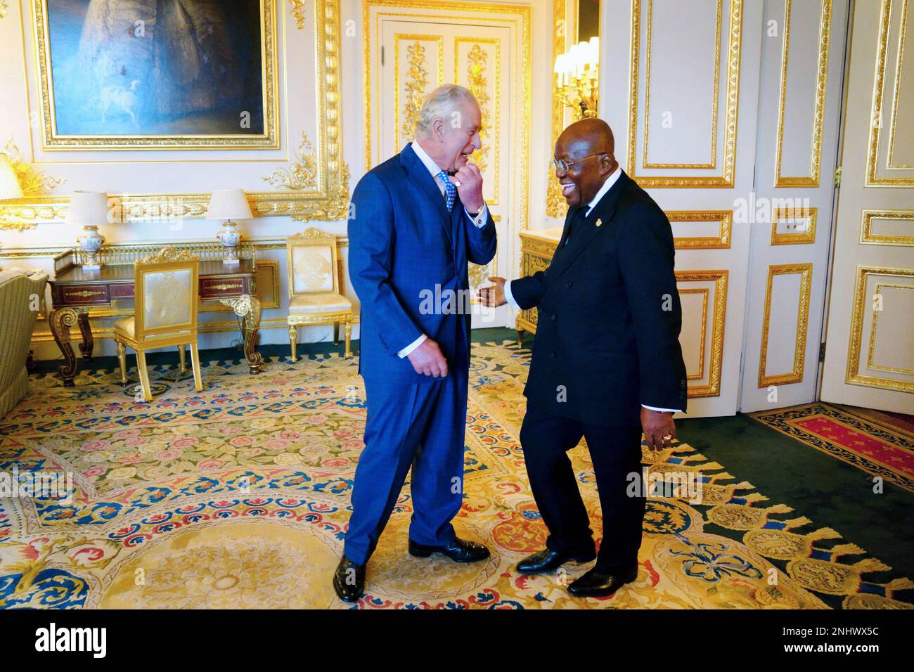 Britain's King Charles III, left, holds an audience with Ghana ...