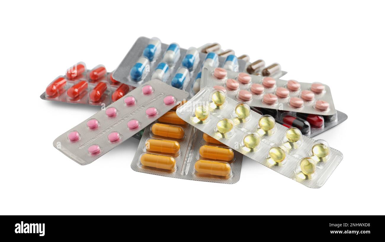 Pile of different pills in blister packs on white background Stock ...