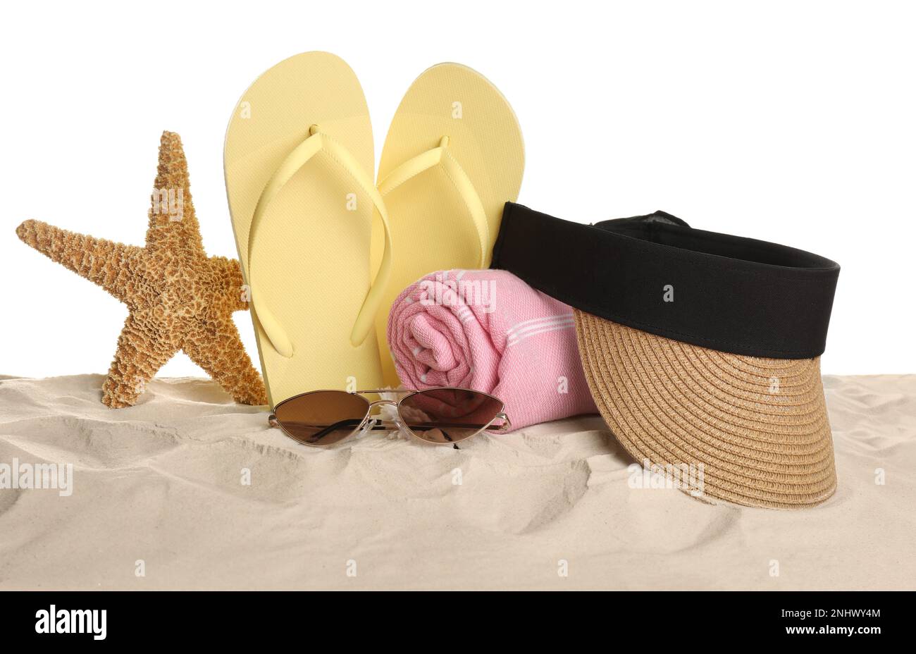 Different beach objects on sand against white background Stock Photo ...
