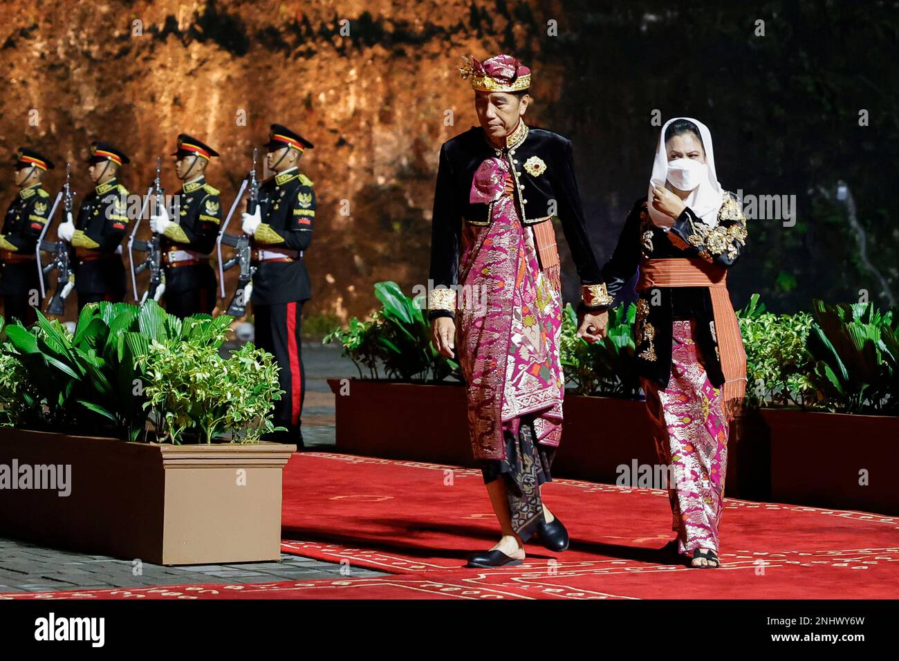 Indonesian President Joko Widodo and his wife Iriana Widodo walks ...