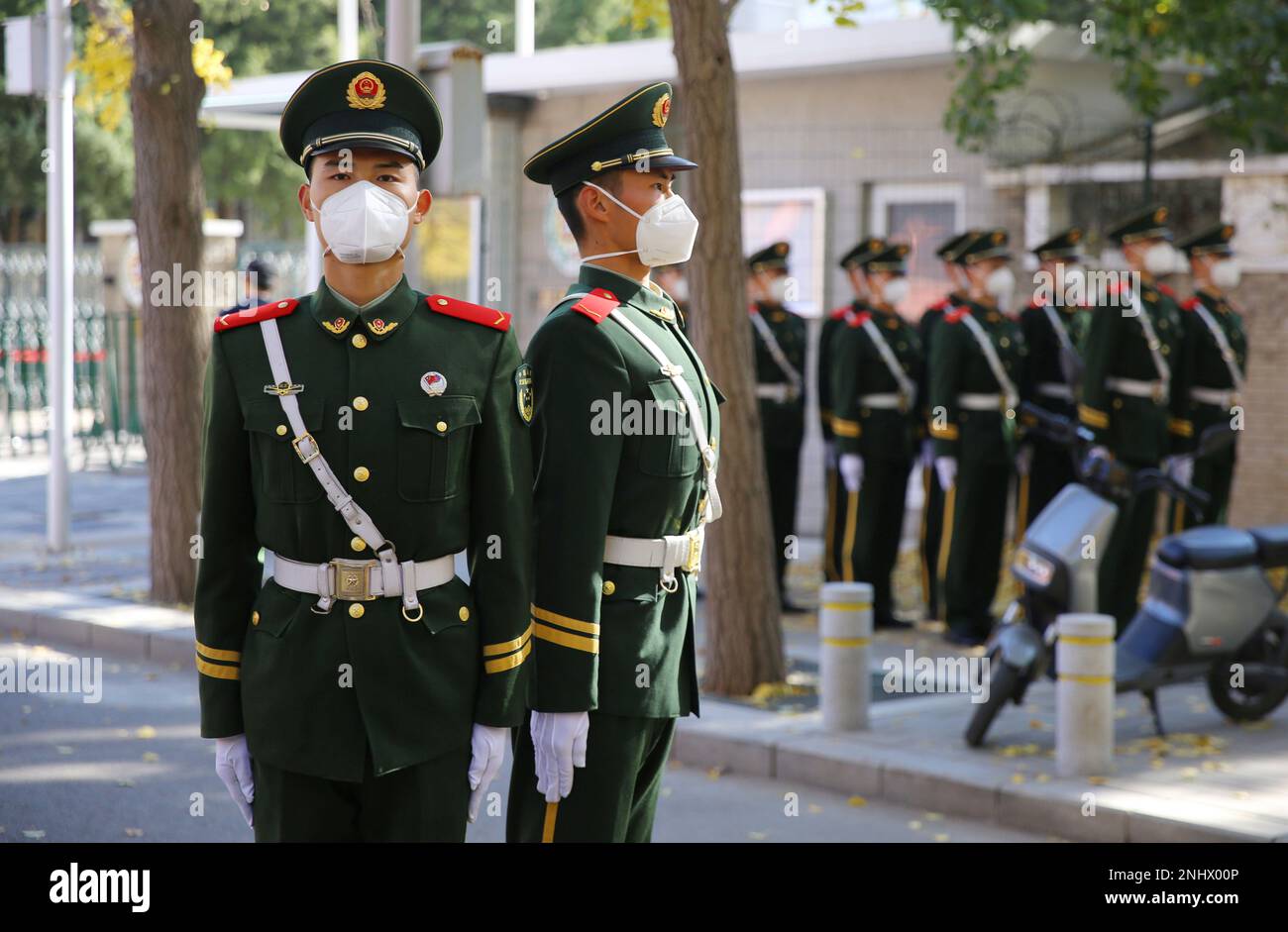 Chinese armed police officers march on a street in Beijing on Nov. 5 ...