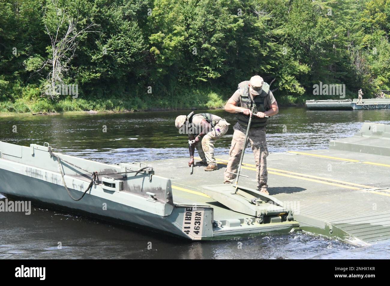 Soldiers from the 459th Engineer Company conduct rafting operations on ...