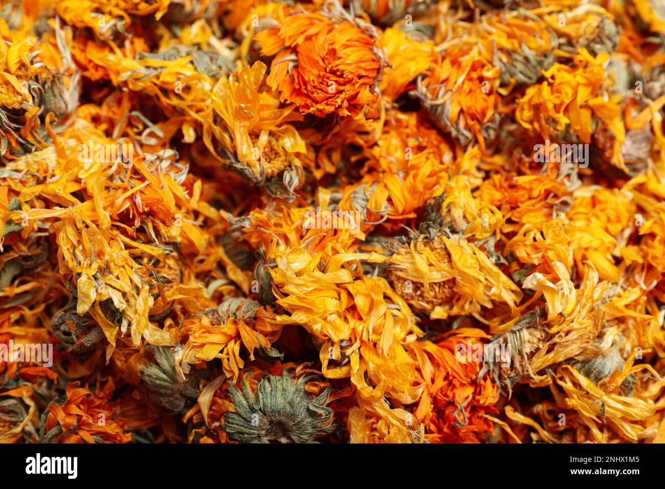 Pile of dry calendula flowers as background, closeup Stock Photo - Alamy