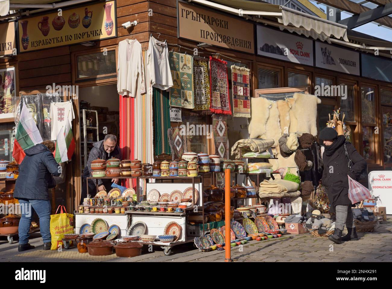 People browsing market stalls at the Zhenski Pazar, or Ladies Bazaar ...