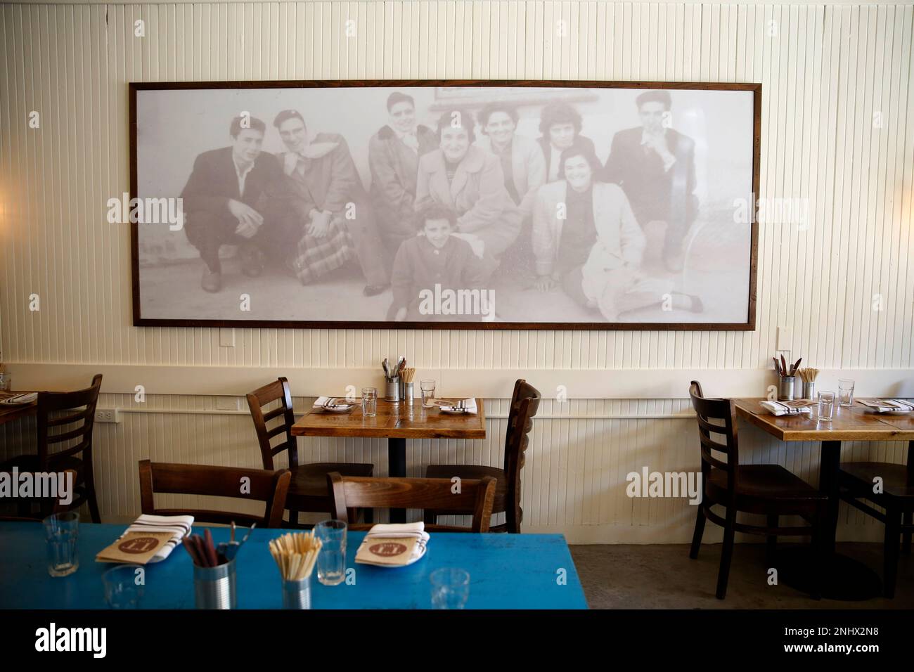 Family photo displayed on a wall of owner Manuel Azevedo's newest ...
