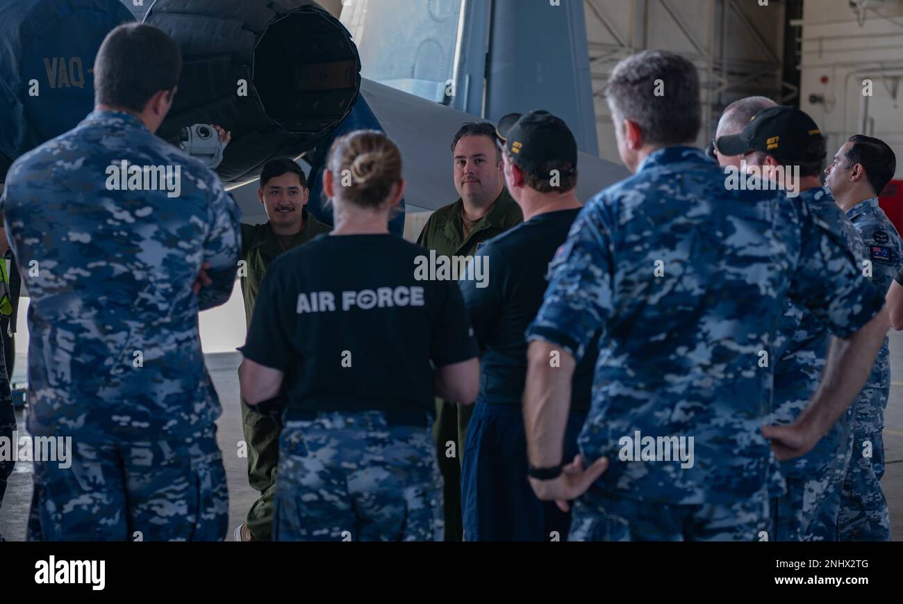 U.S. Navy service members give an immersion briefing to Royal ...