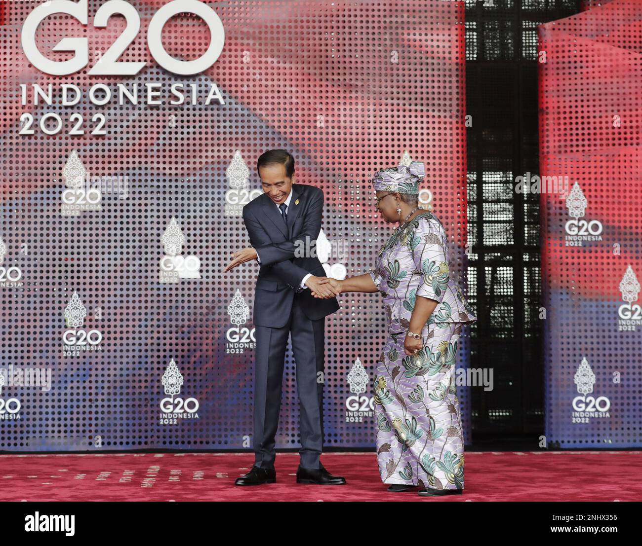 Indonesia President Joko Widodo, right, greets Director General of the ...