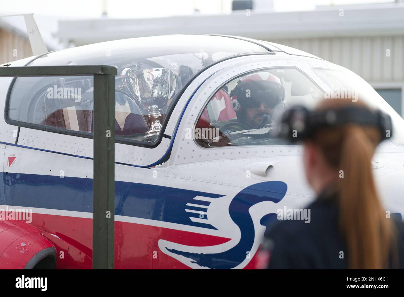 Captain Steven Sparks pilots an aircraft carrying the Grey Cup to a ...