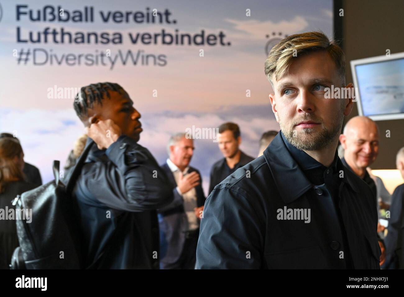 Germany's national team player Niclas Fuellkrug, right, attends a ...