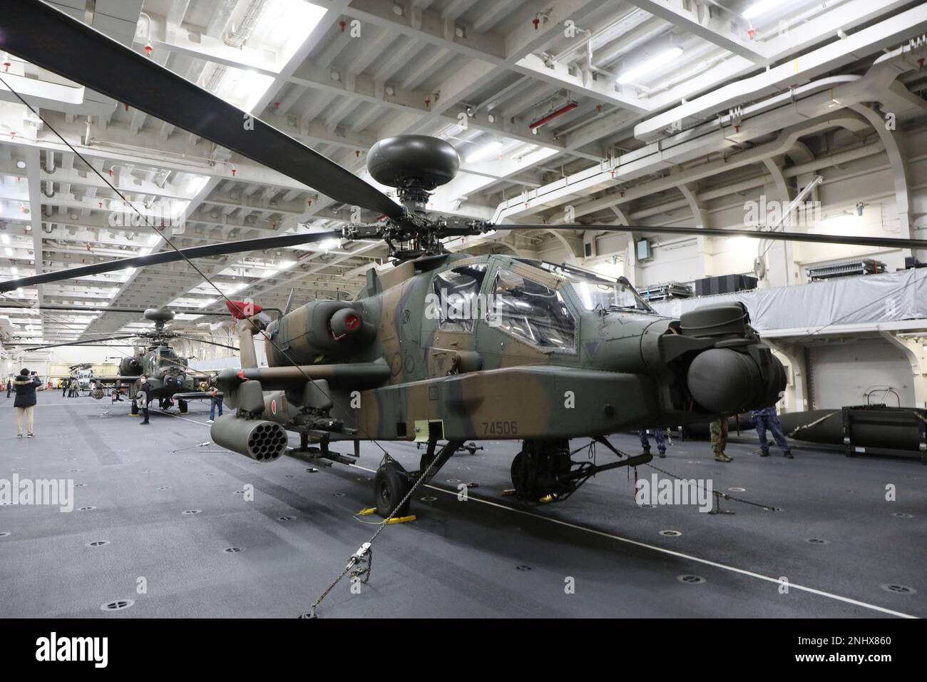 An AH-47 helicopter of Japan Maritime Self-Defense Forces is stored on ...