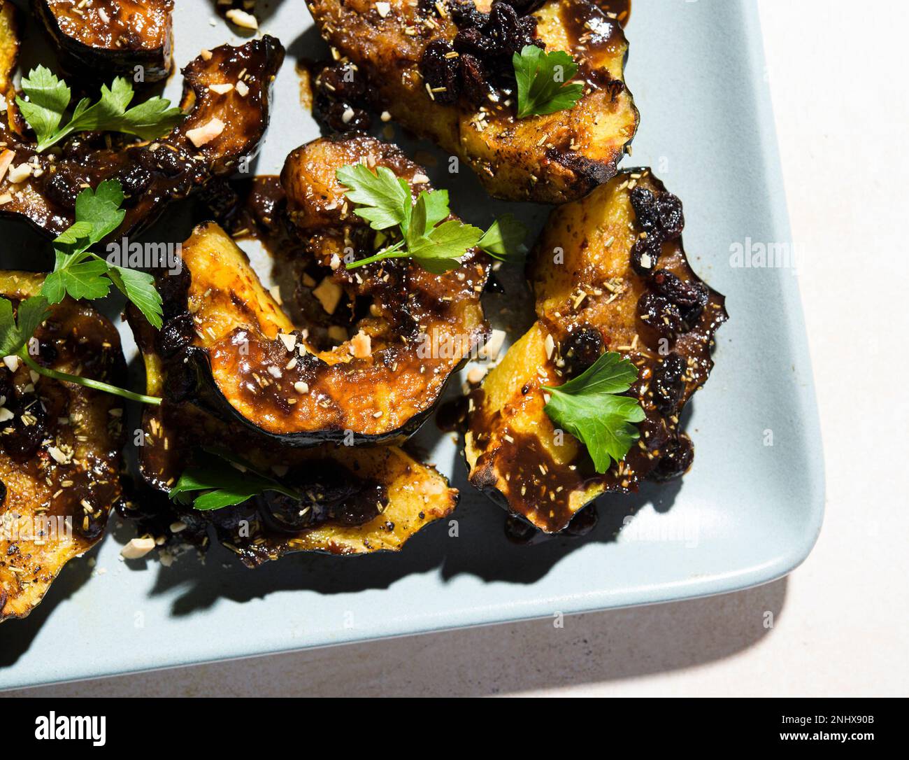 This image released by Milk Street shows a recipe for Agrodolce Acorn ...