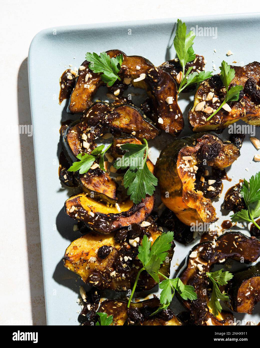 This image released by Milk Street shows a recipe for Agrodolce Acorn ...