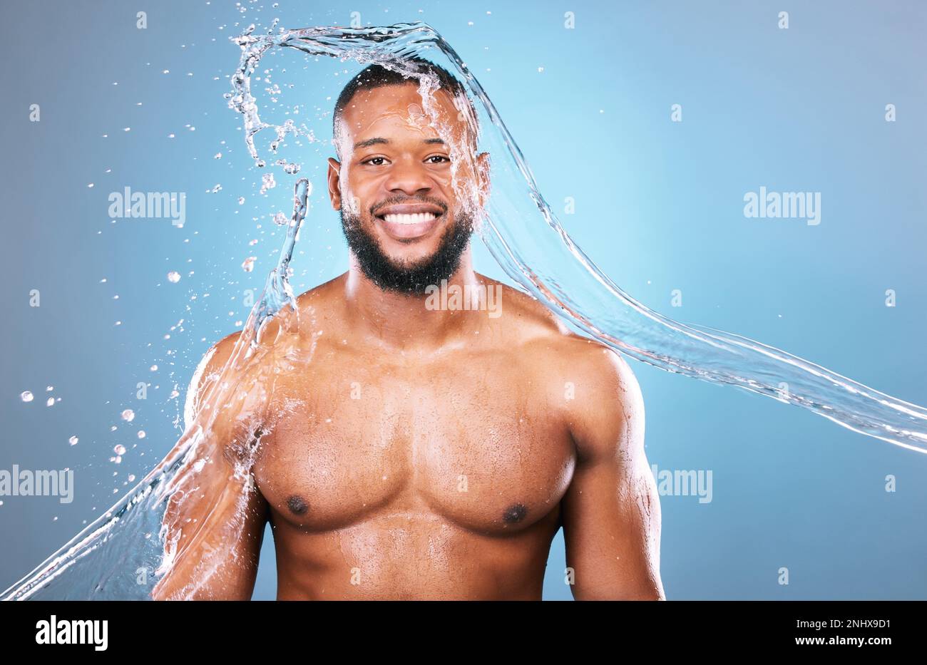 Muscle, portrait and water on black man cleaning, hygiene and skincare ...