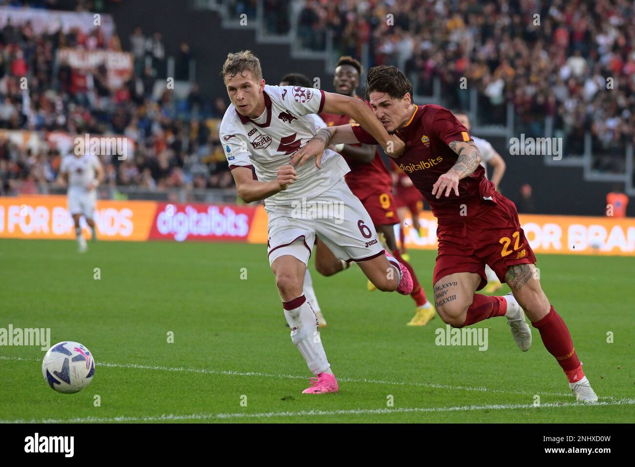 Torino's David Zima challenges Roma's Nicolo' Zaniolo, right, during ...