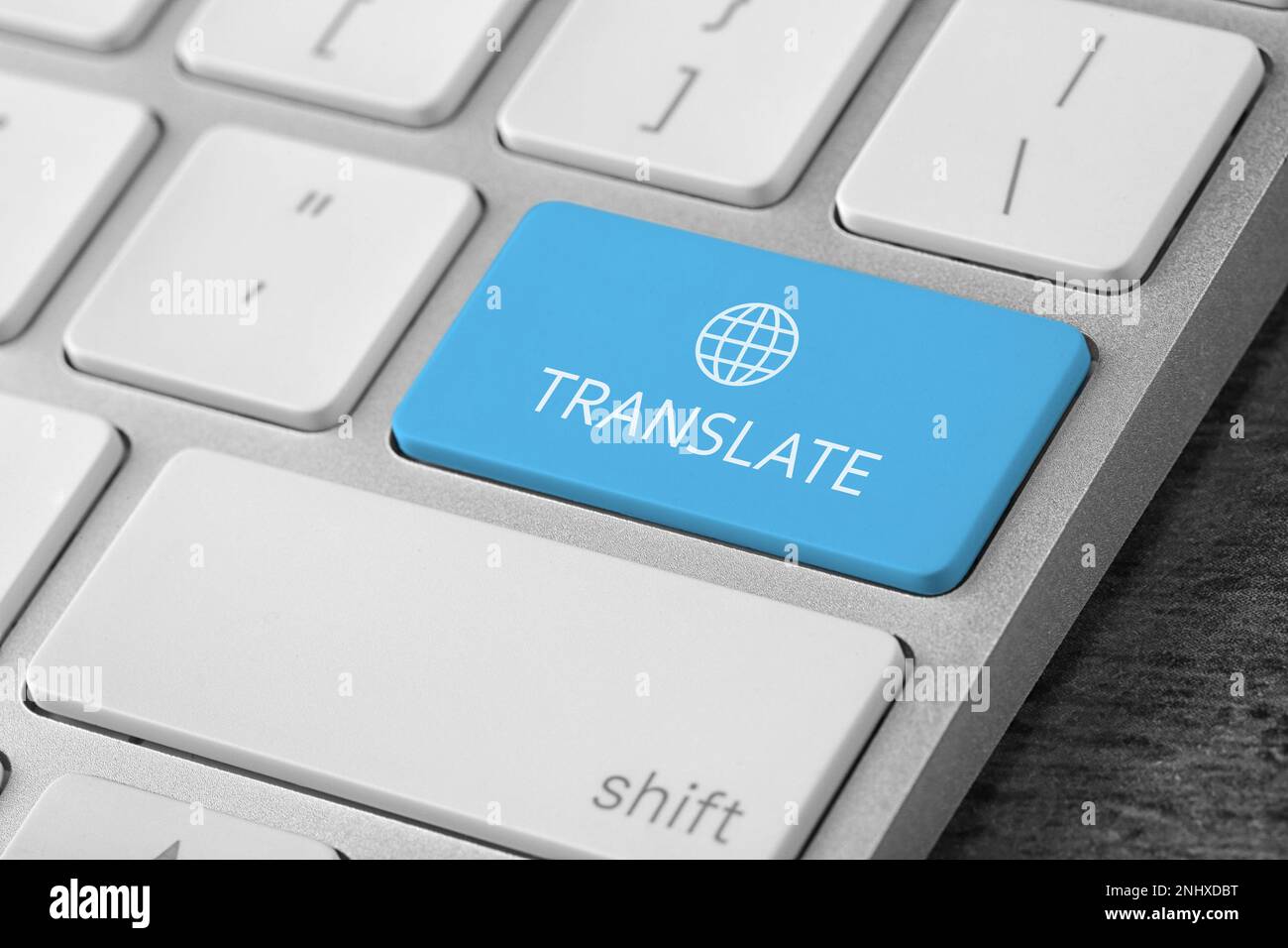 Modern computer keyboard with button for quick translation, closeup ...