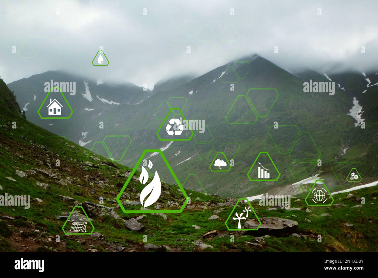 Digital eco icons and beautiful mountains on cloudy day Stock Photo - Alamy
