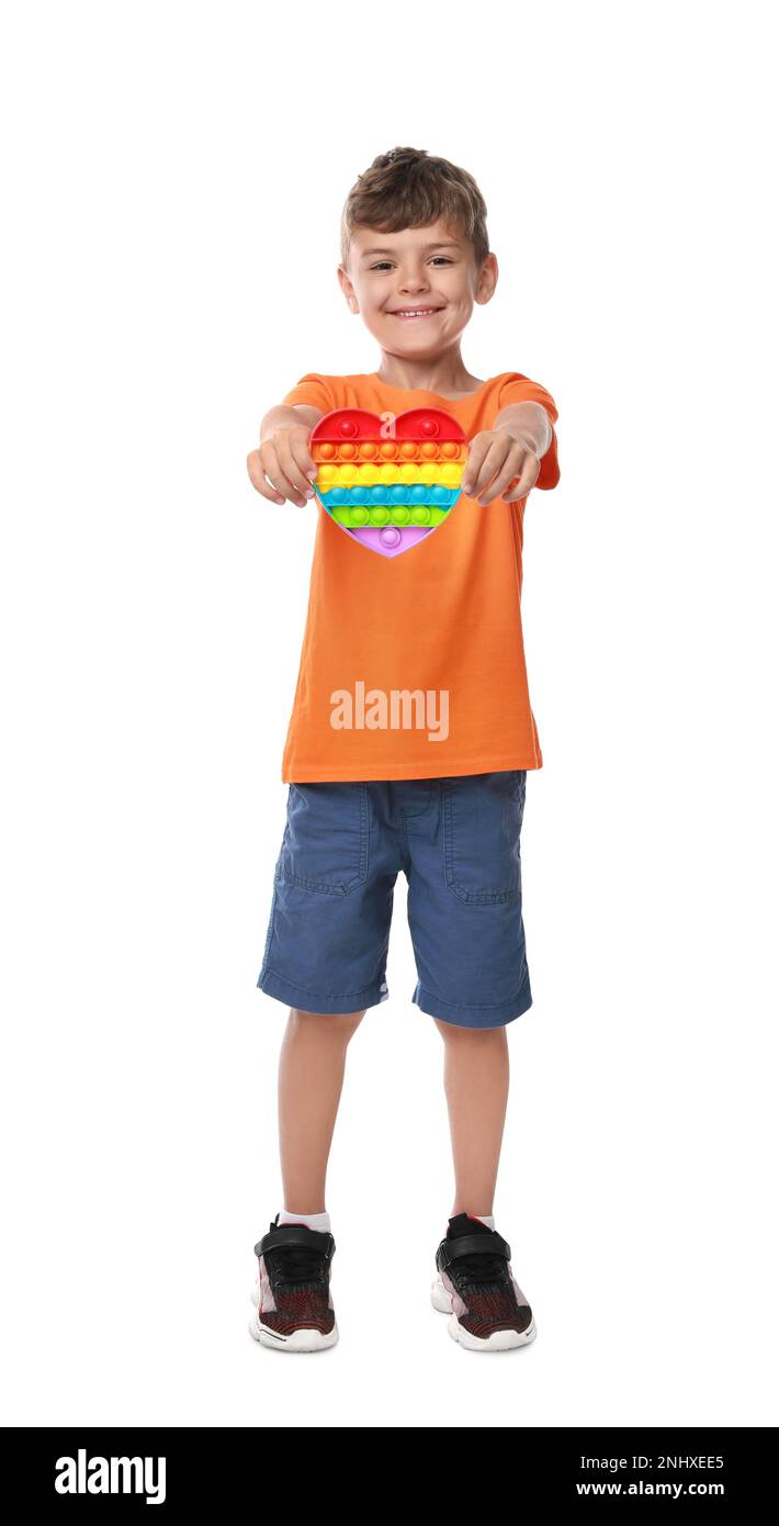 Boy with pop it fidget toy on white background Stock Photo - Alamy