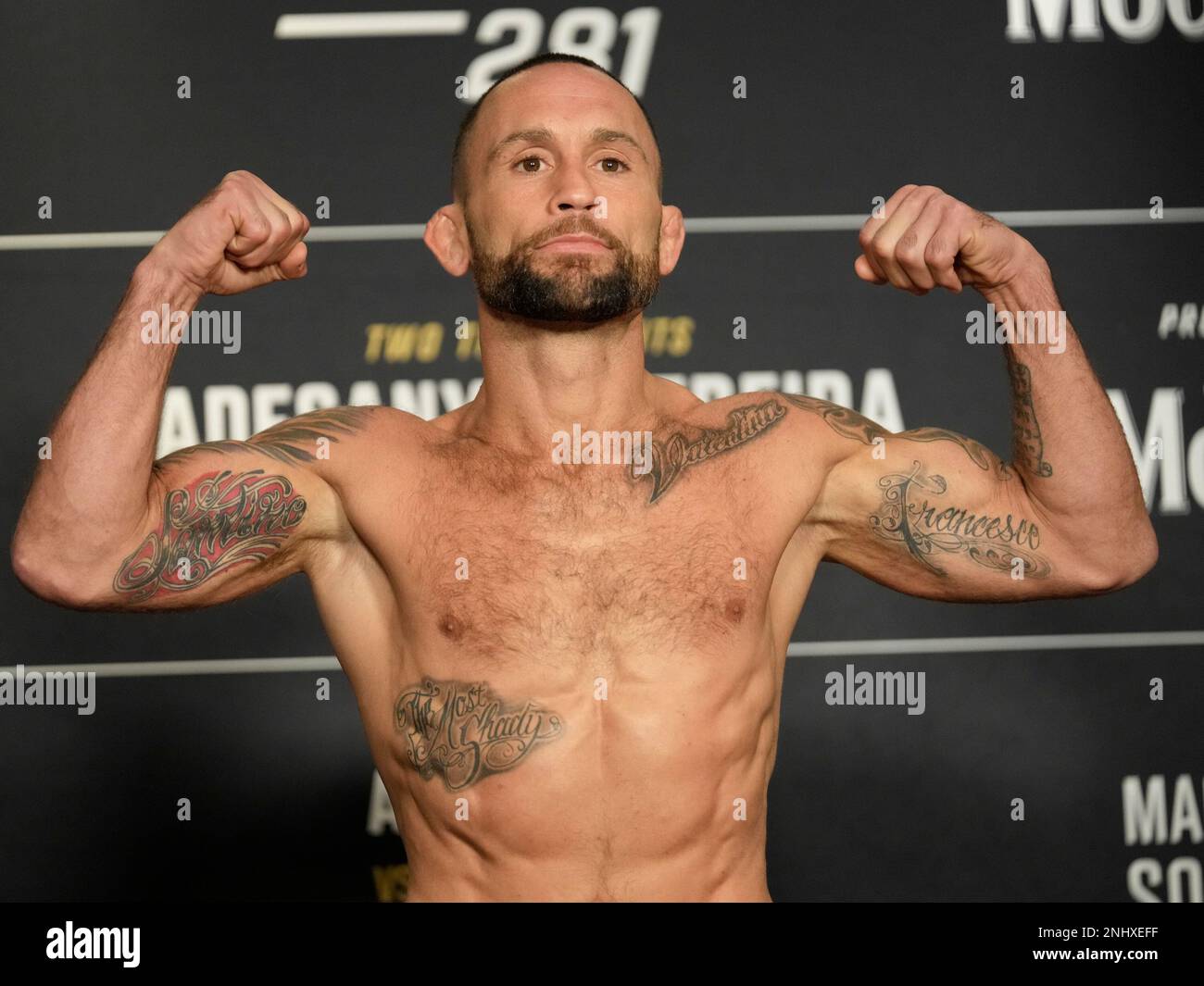 NEW YORK CITY, NY - NOVEMBER 11: Frankie Edgar steps on the scale for ...