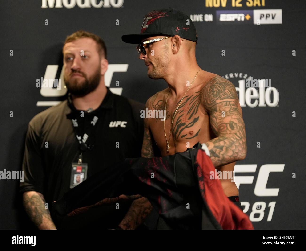 NEW YORK CITY, NY - NOVEMBER 11: Dustin Poirier steps on the scale for ...