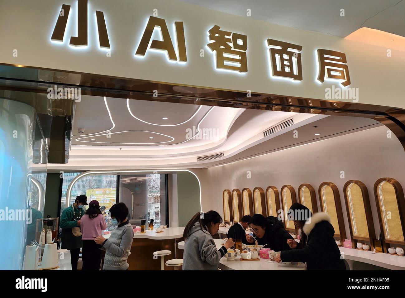 SHANGHAI, CHINA - FEBRUARY 22, 2023 - Customers eat at a robot noodle ...
