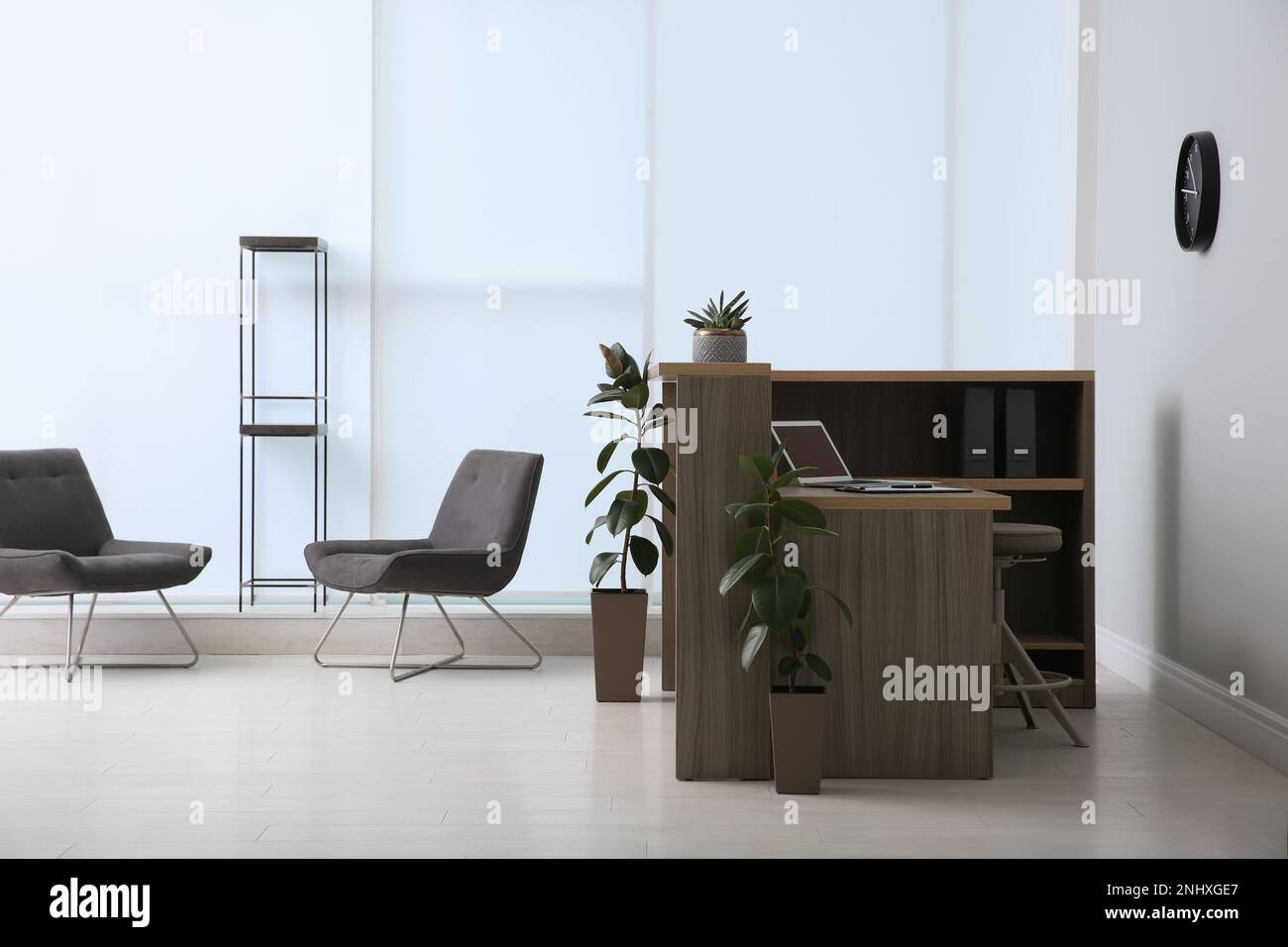 Lobby interior with stylish wooden receptionist desk Stock Photo - Alamy