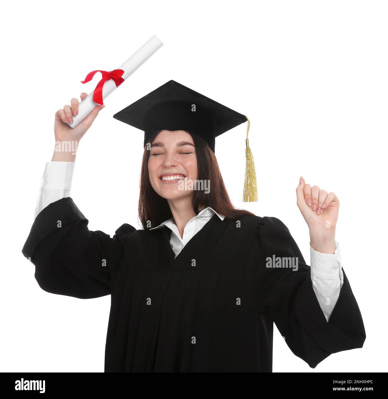 Happy student in academic dress with diploma on white background Stock ...