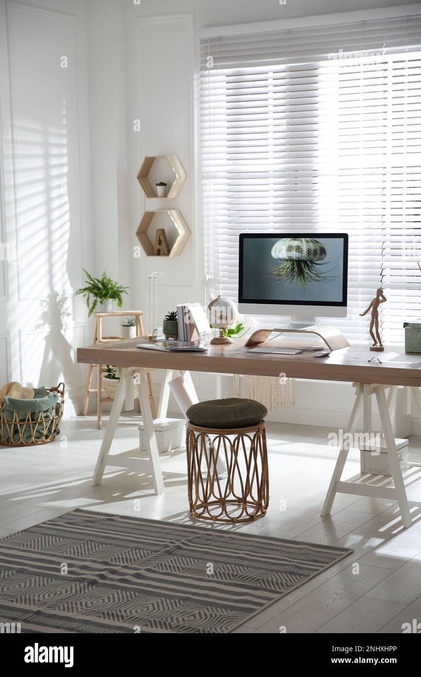 Stylish home office interior with comfortable workplace Stock Photo - Alamy