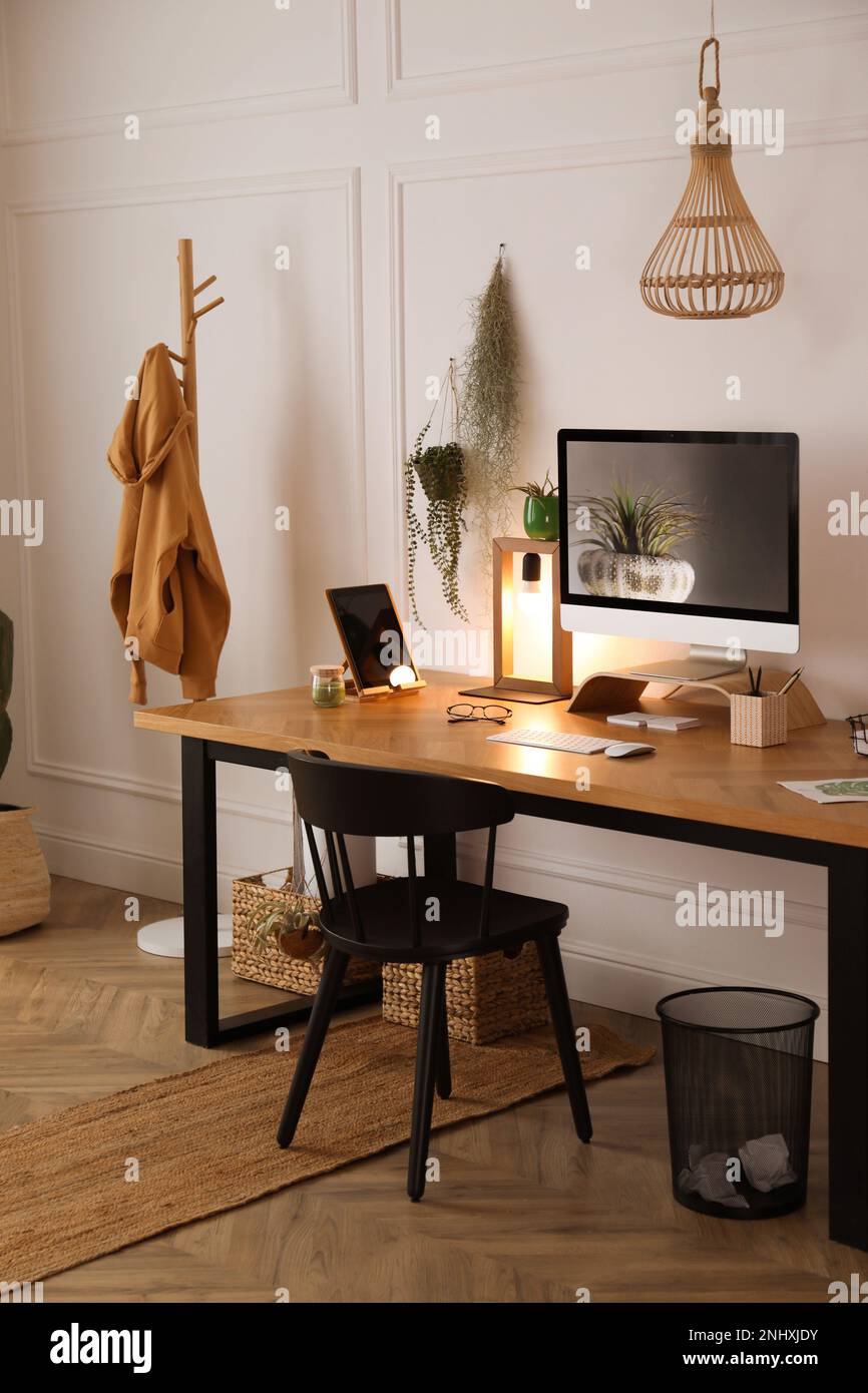 Modern workplace with computer in room. Interior design Stock Photo - Alamy