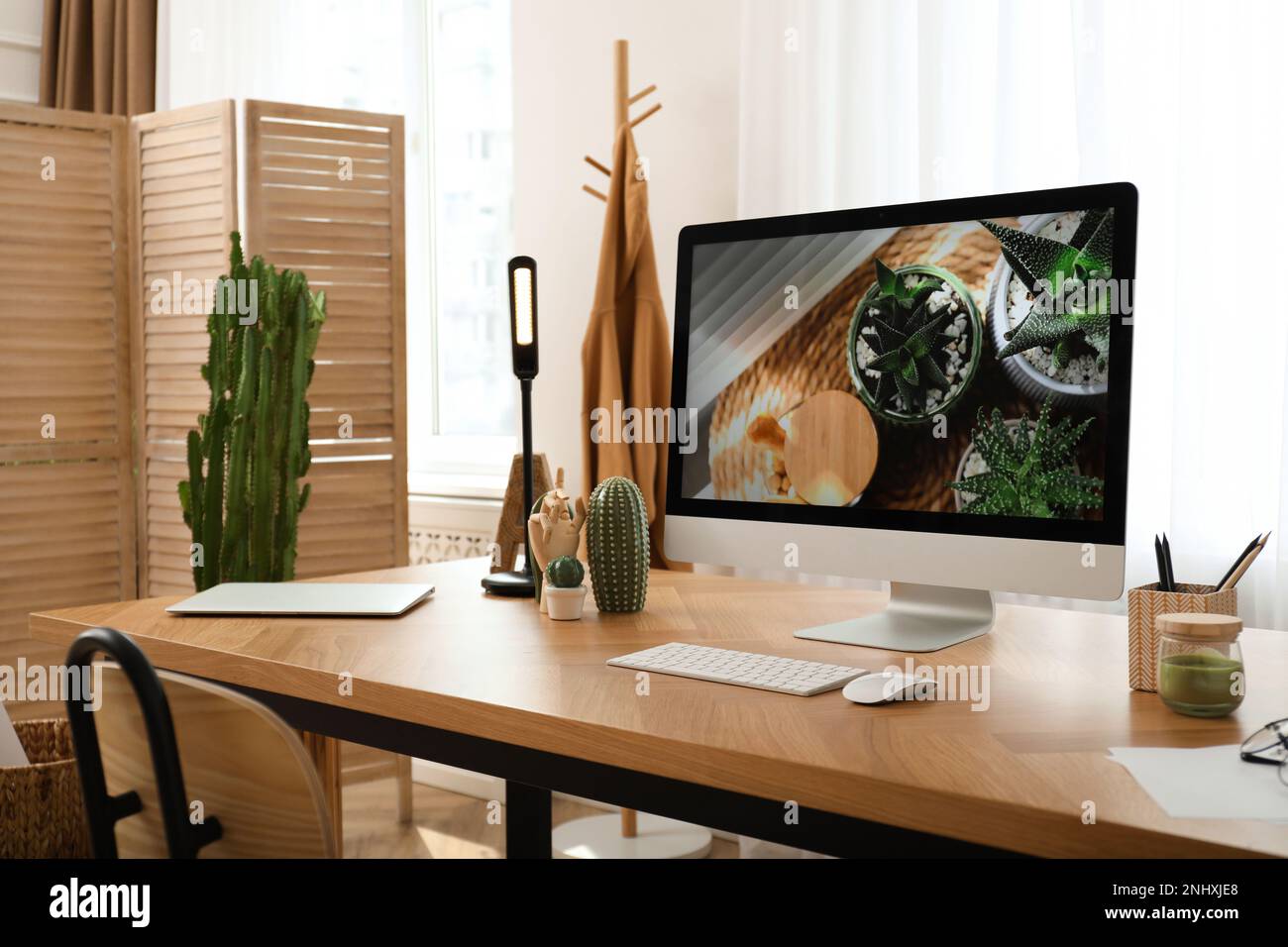 Modern workplace with computer in room. Interior design Stock Photo - Alamy