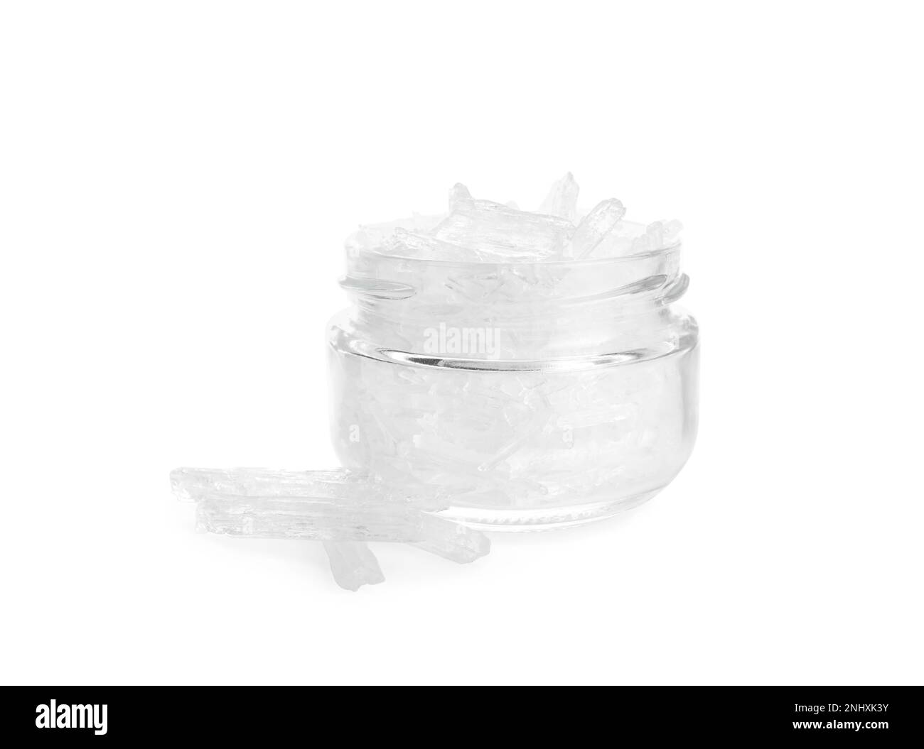 Menthol crystals in jar on white background Stock Photo - Alamy