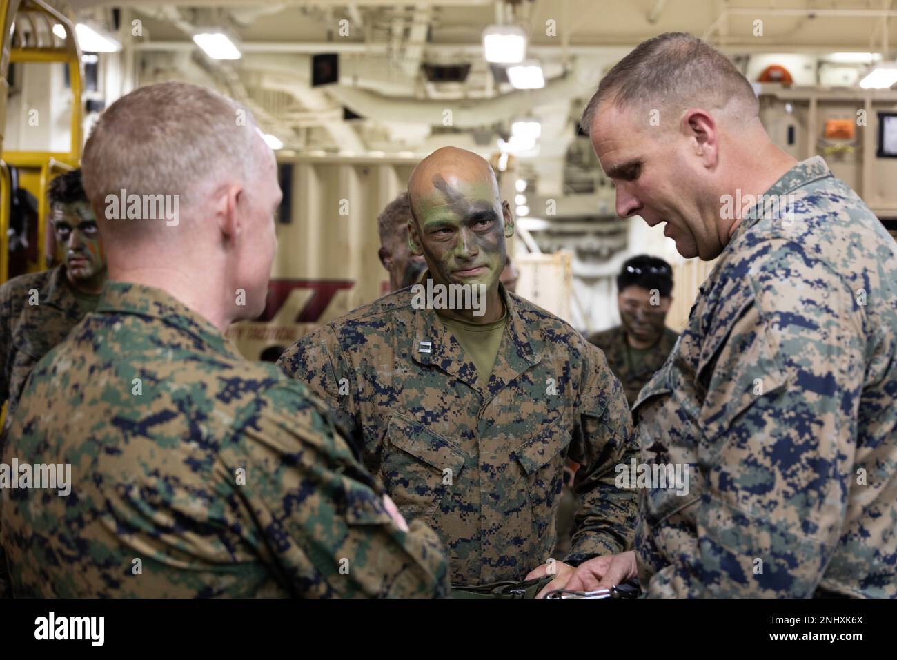 U.S. Marine Corps Capt. Adam North, center, a company commander with ...