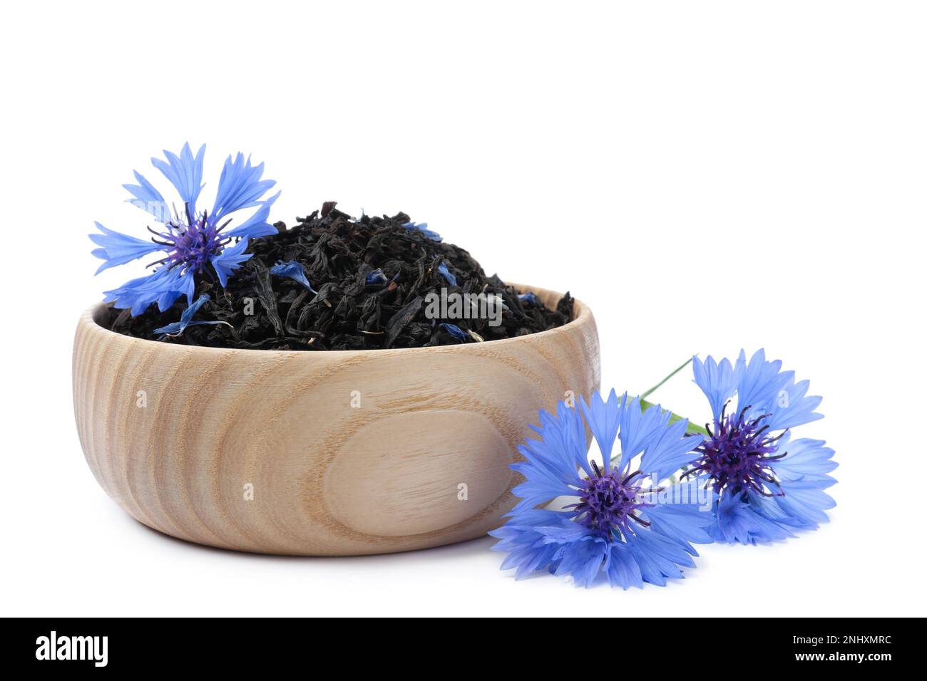 Dried cornflower tea and fresh flowers on white background Stock Photo ...