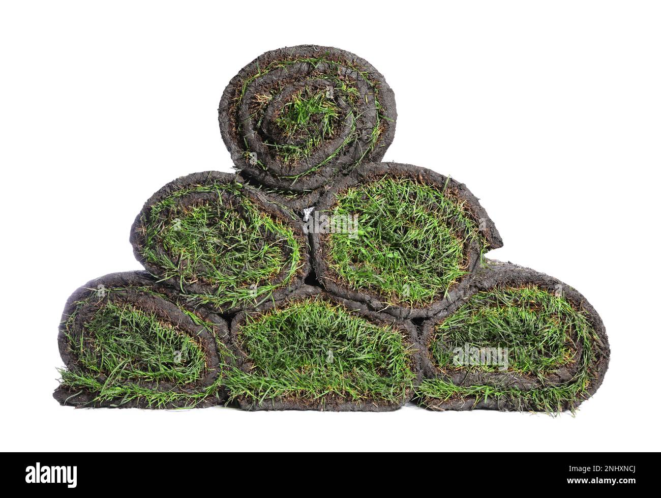 Rolls of grass sod on white background Stock Photo - Alamy