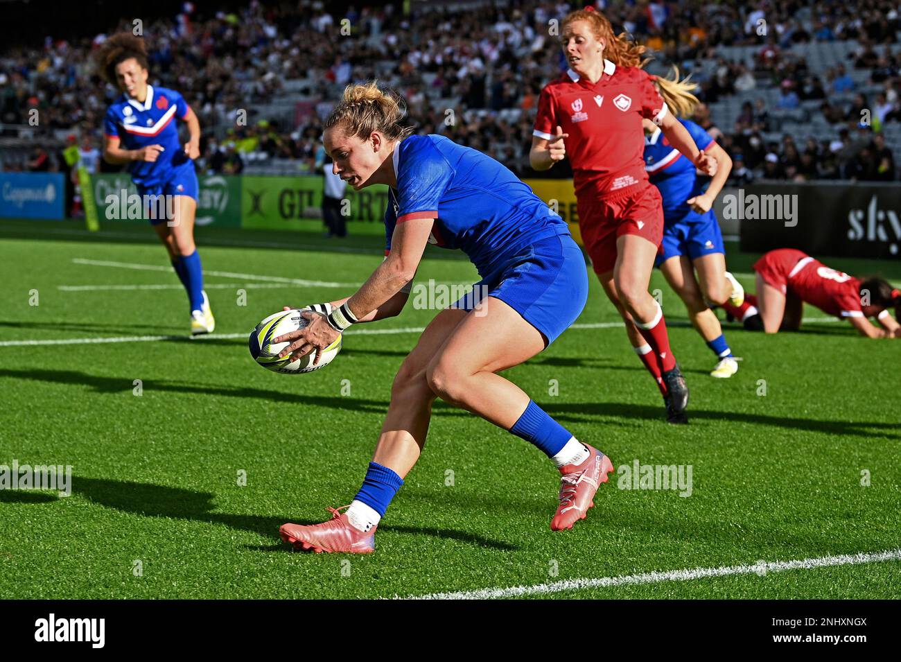 France's Marine Menager score a try against Canada in the bronze medal ...