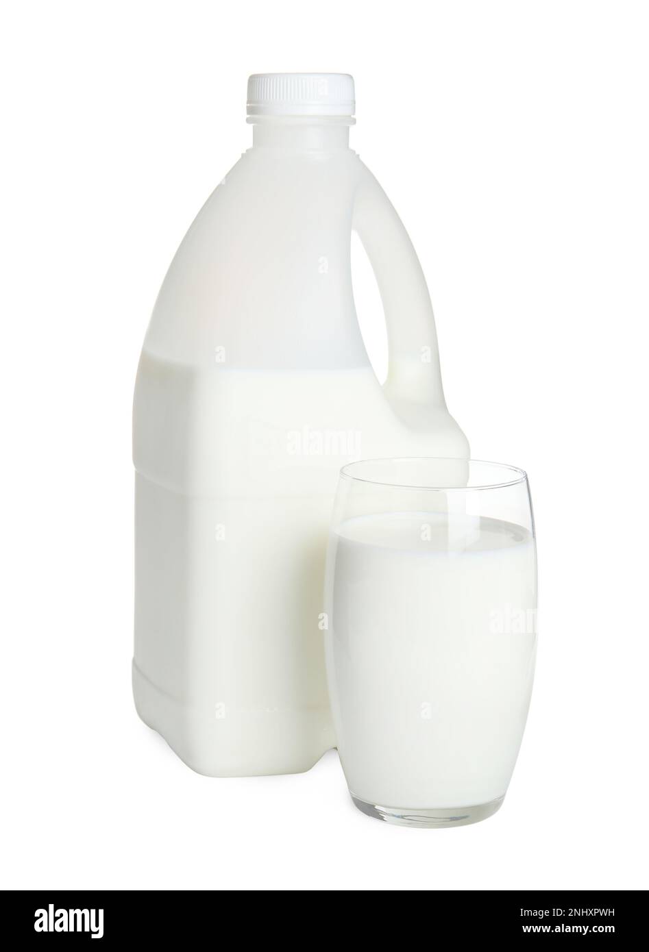 Gallon bottle and glass of milk on white background Stock Photo - Alamy