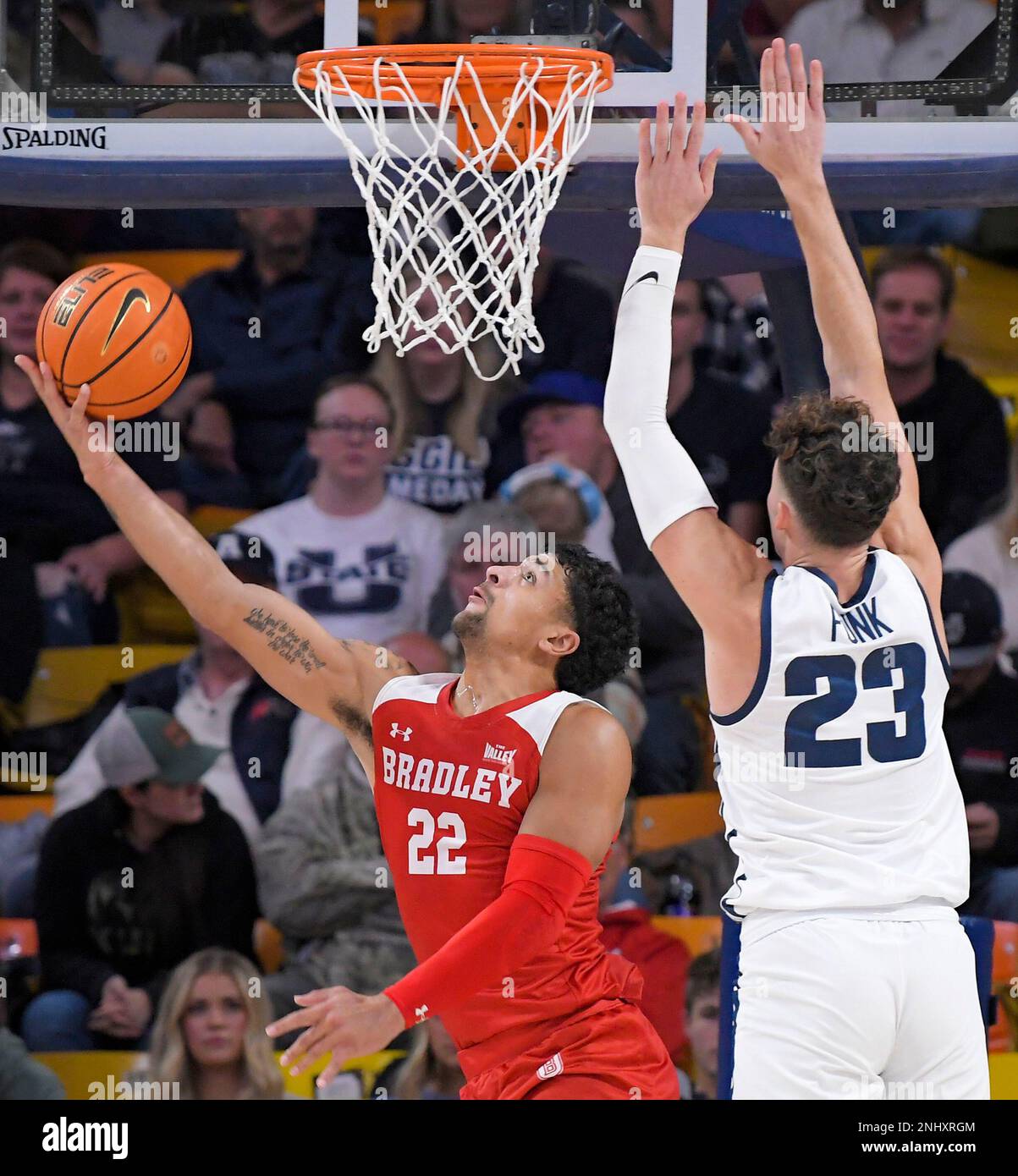 Bradley forward Ja'Shon Henry (22) shoots as Utah State forward Taylor ...