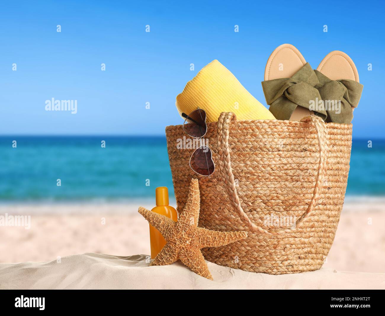 Different beach objects on sandy beach near sea, space for text Stock ...