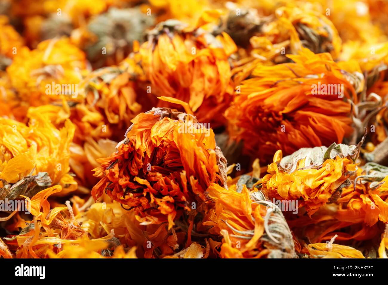 Pile of dry calendula flowers as background, closeup Stock Photo - Alamy