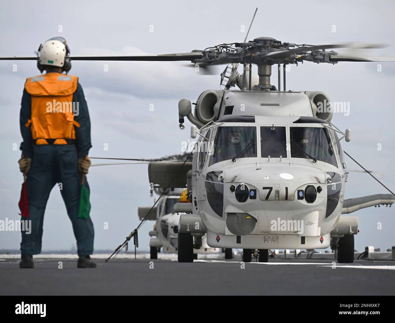 Japanese Maritime Self-Defense Forces deploy its SH 60 K helicopter on ...