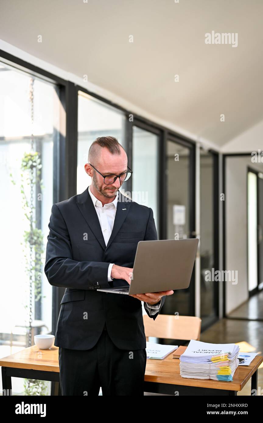 Portrait, Smart and focused Caucasian businessman or male CEO in formal ...