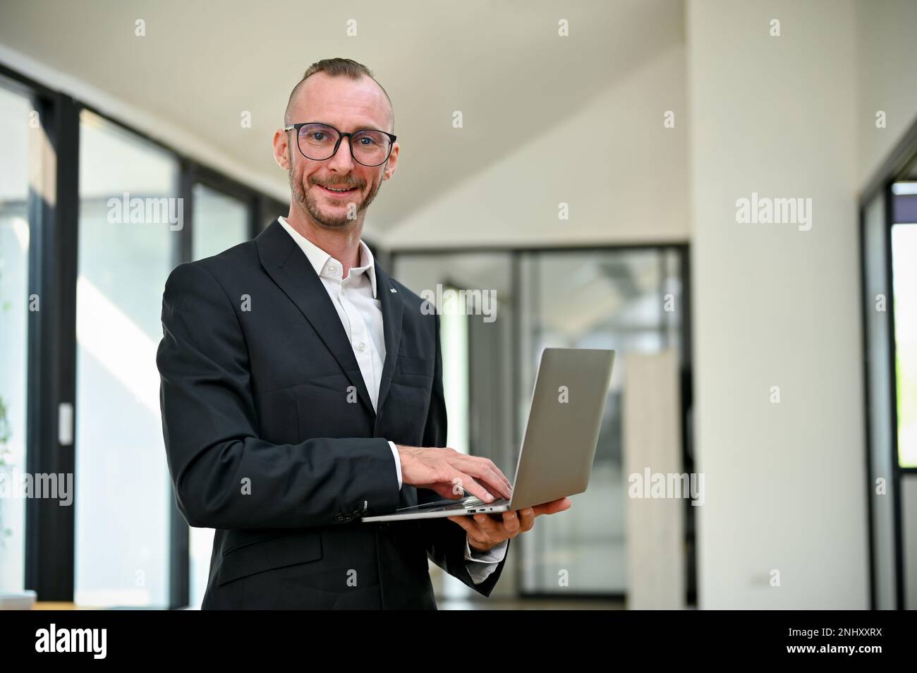 Confident and successful Caucasian businessman or male CEO in formal ...